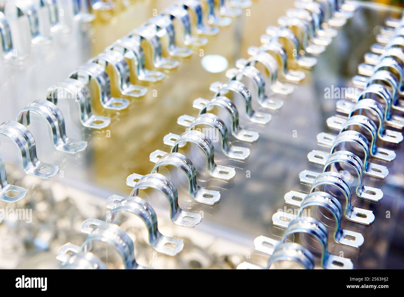 Metal fasteners for electrical engineering in store Stock Photo - Alamy