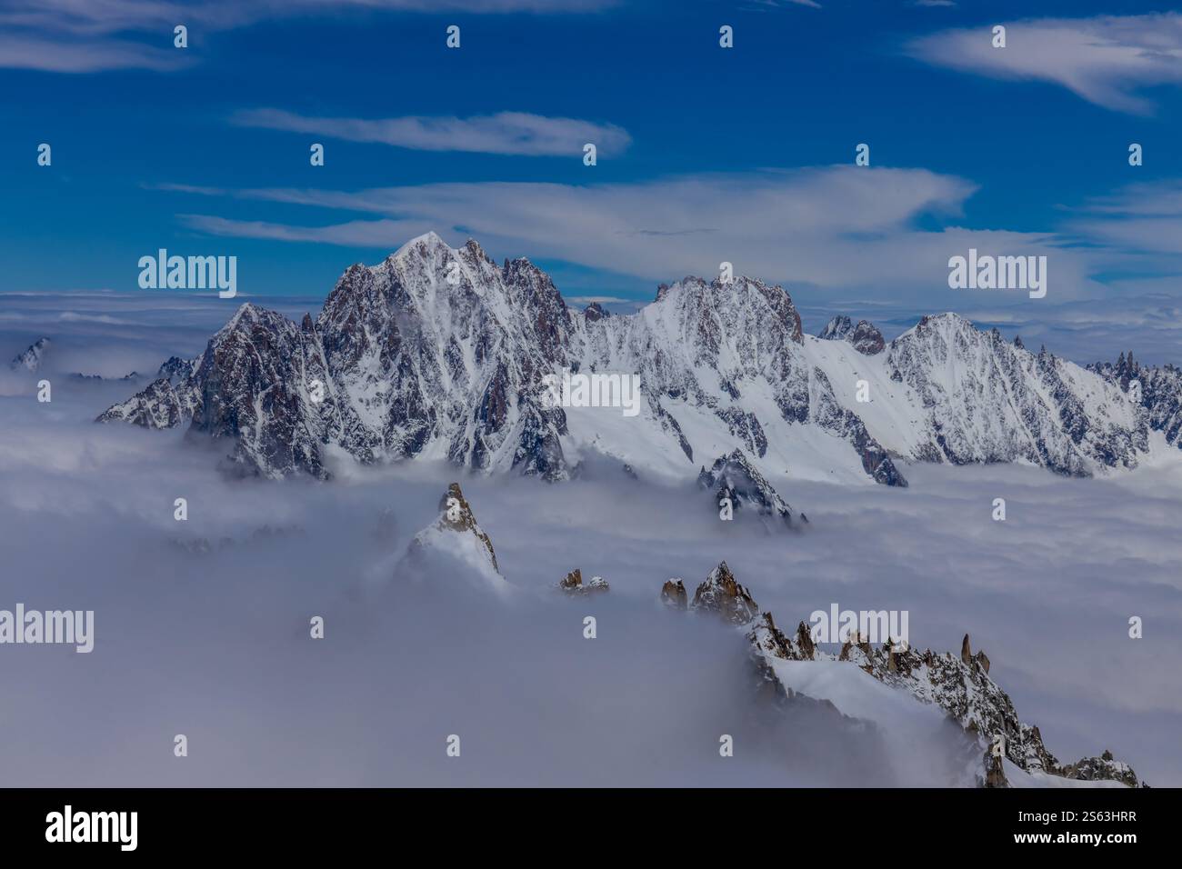 Snow mountain summits and white ice glacier in the Alps. Mont Blanc ...