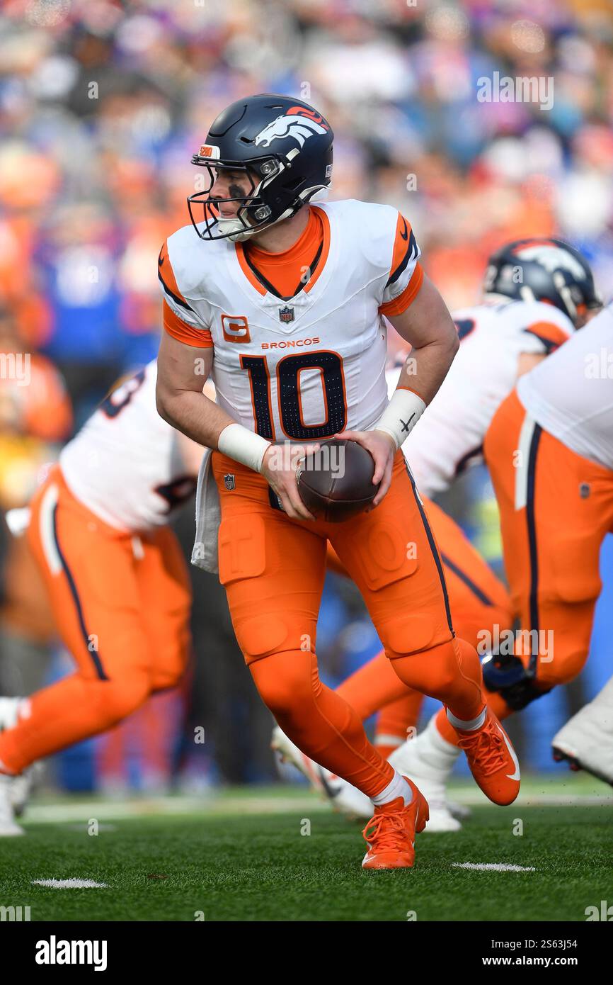 Denver Broncos quarterback Bo Nix (10) runs with the ball during the ...