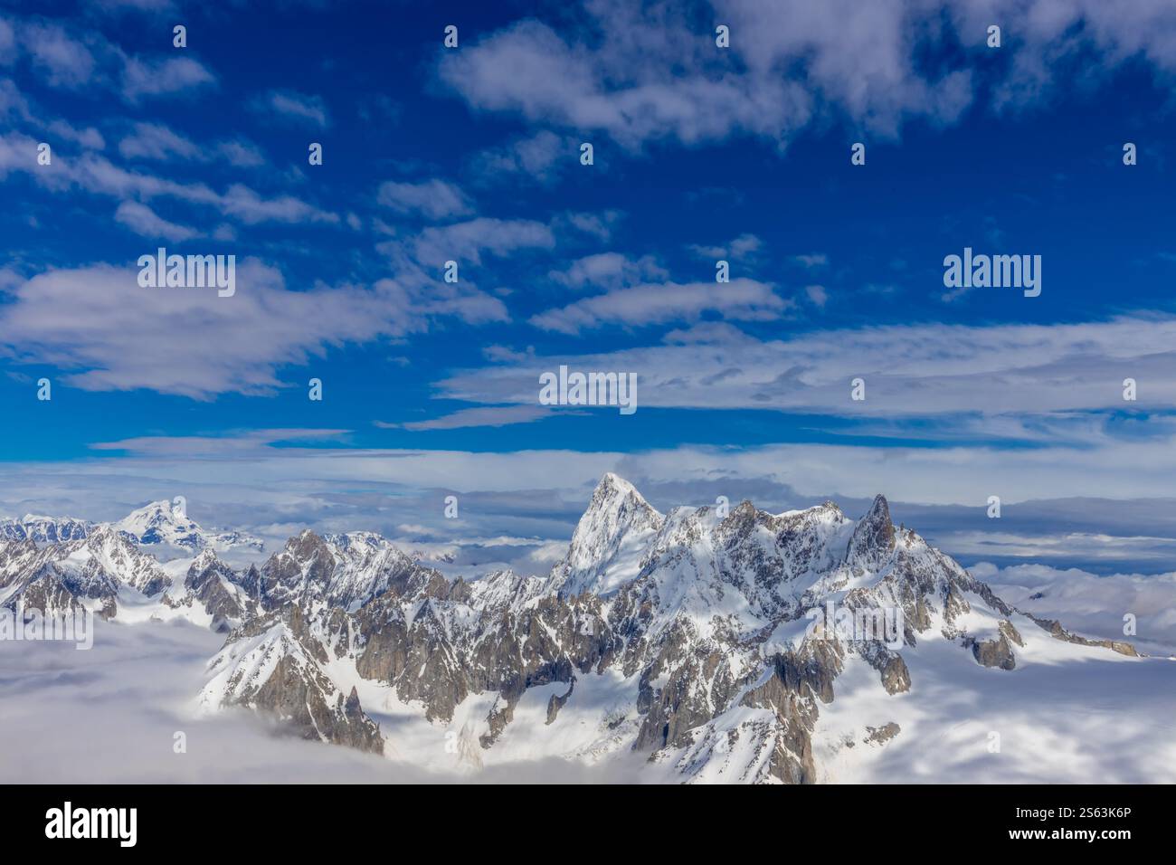 Snow mountain summits and white ice glacier in the Alps. Mont Blanc ...