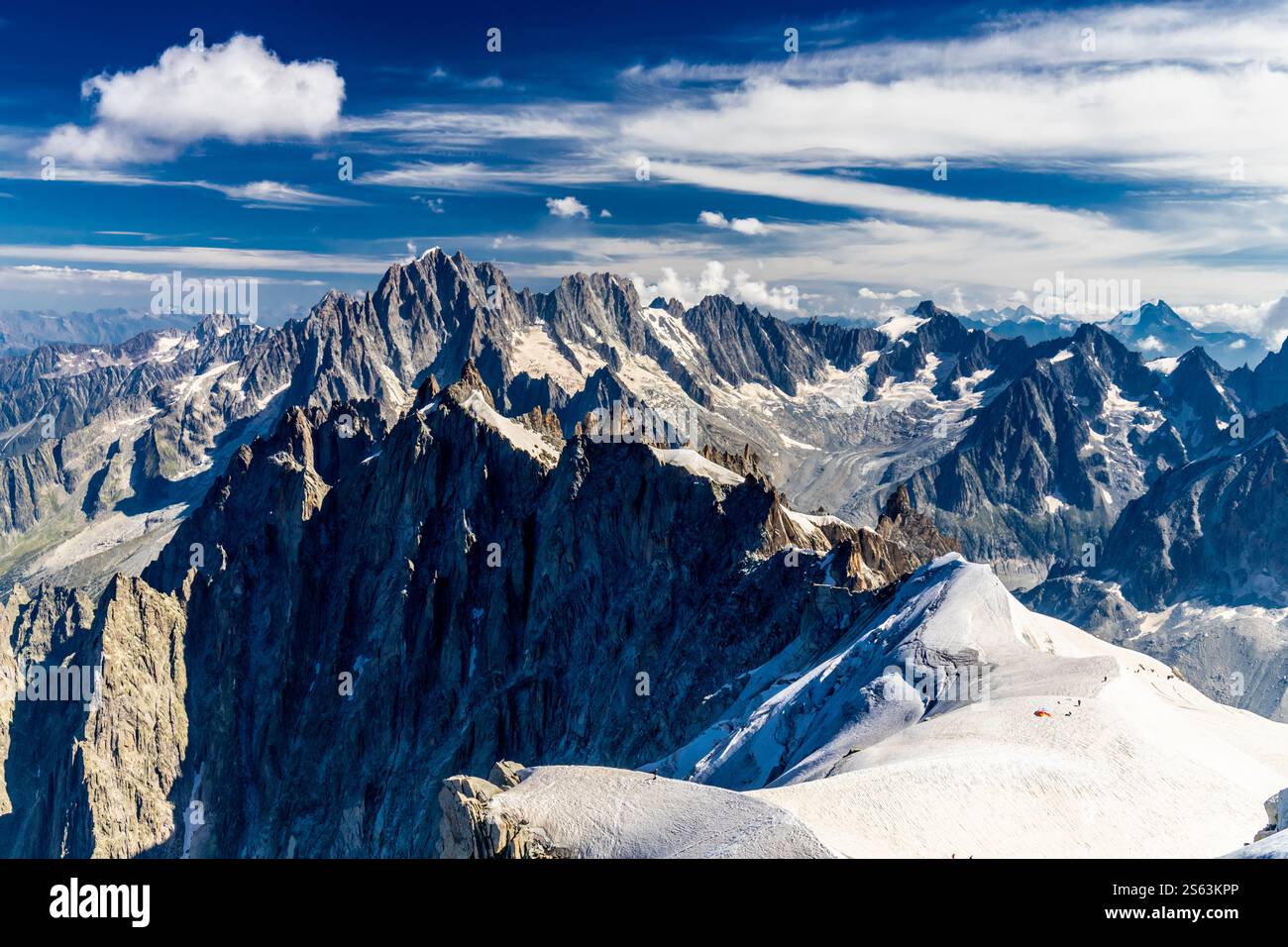 Snow mountain summits and white ice glacier in the Alps. Mont Blanc climbing route and views ...