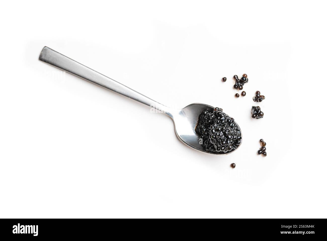 Black Sturgeon caviar on spoon isolated on white background, top view ...