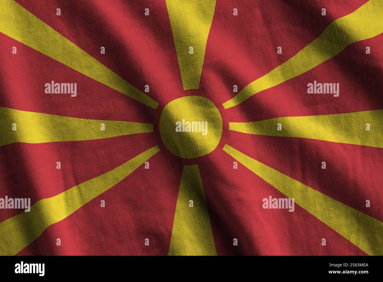 Macedonia flag with big folds waving close up under the studio light ...