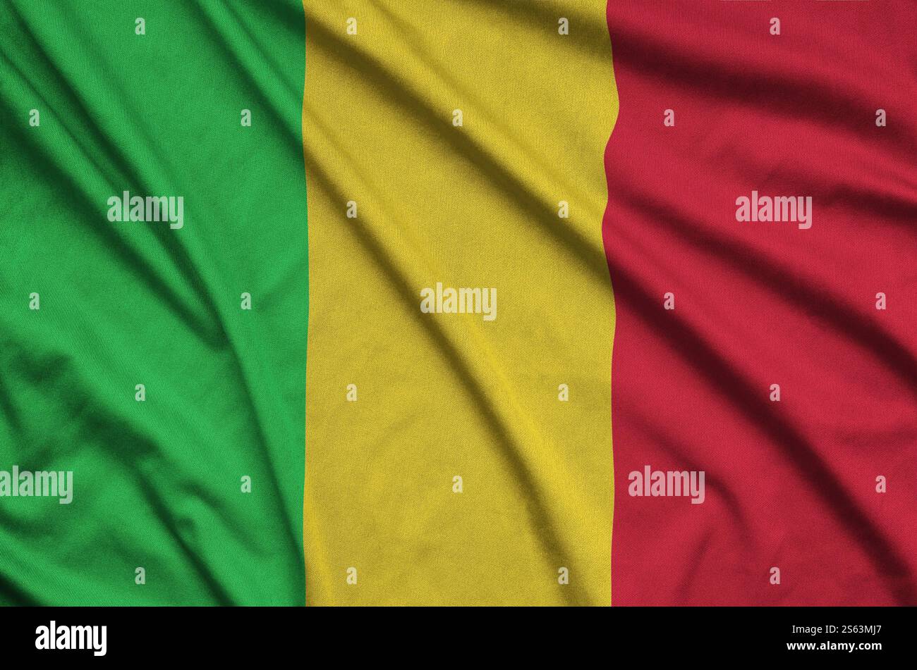 Mali flag is depicted on a sports cloth fabric with many folds. Sport ...