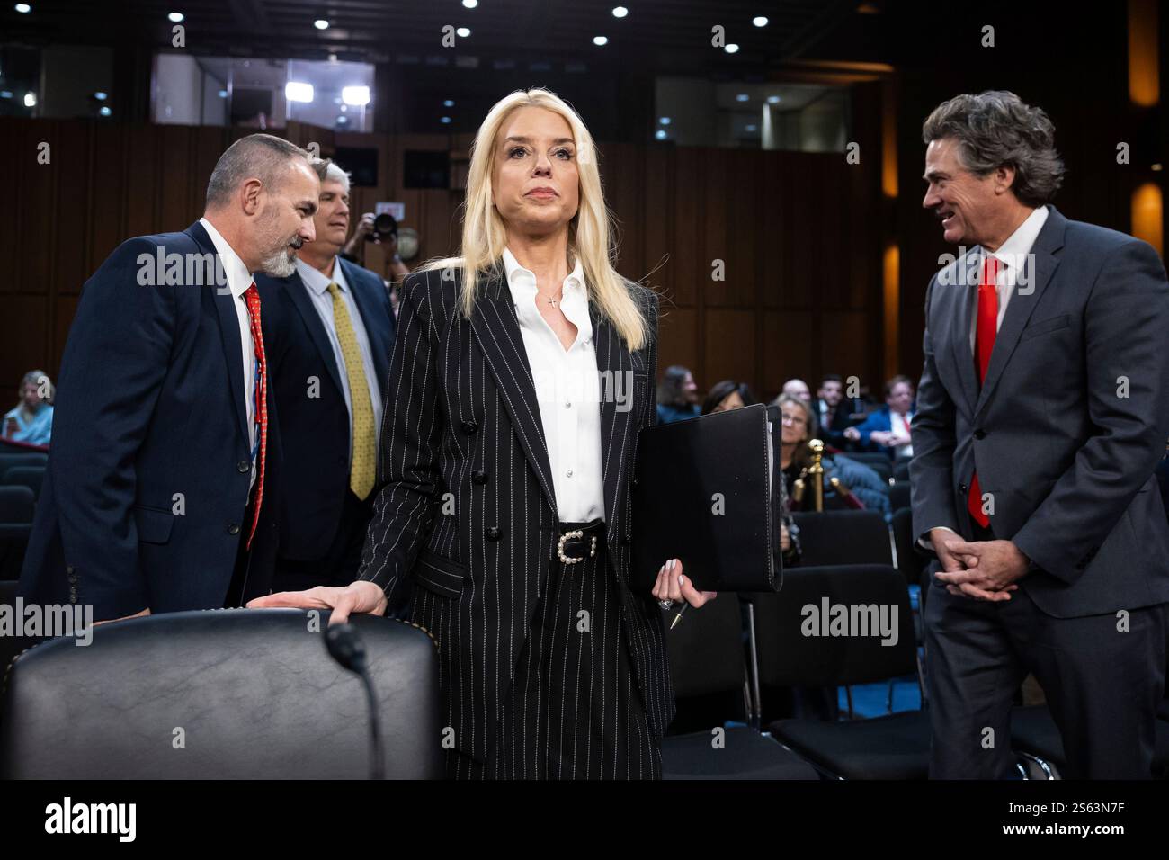Pam Bondi, President-elect Donald Trump's nominee for attorney general, returns from a recess ...