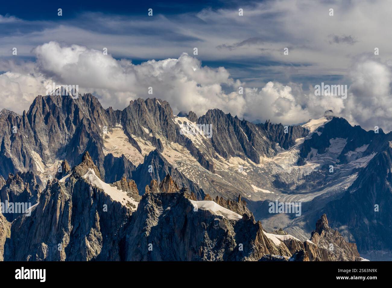 Snow mountain summits and white ice glacier in the Alps. Mont Blanc ...