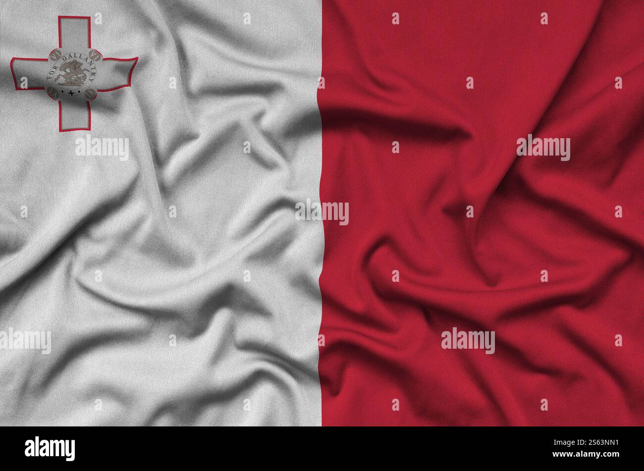 Malta flag is depicted on a sports cloth fabric with many folds. Sport ...