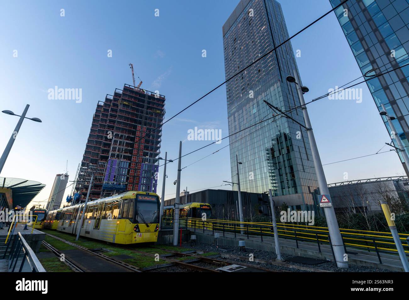 Deansgate tram stop and modern high-rises - Manchester UK Stock Photo ...