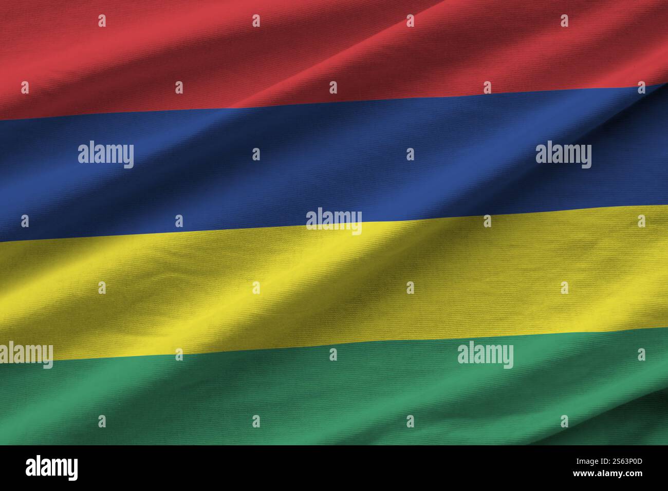 Mauritius flag with big folds waving close up under the studio light ...