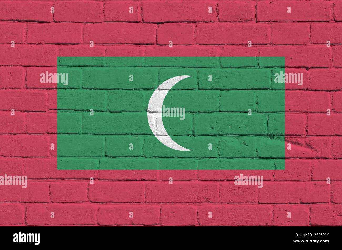 Maldives flag depicted in paint colors on old brick wall close up ...