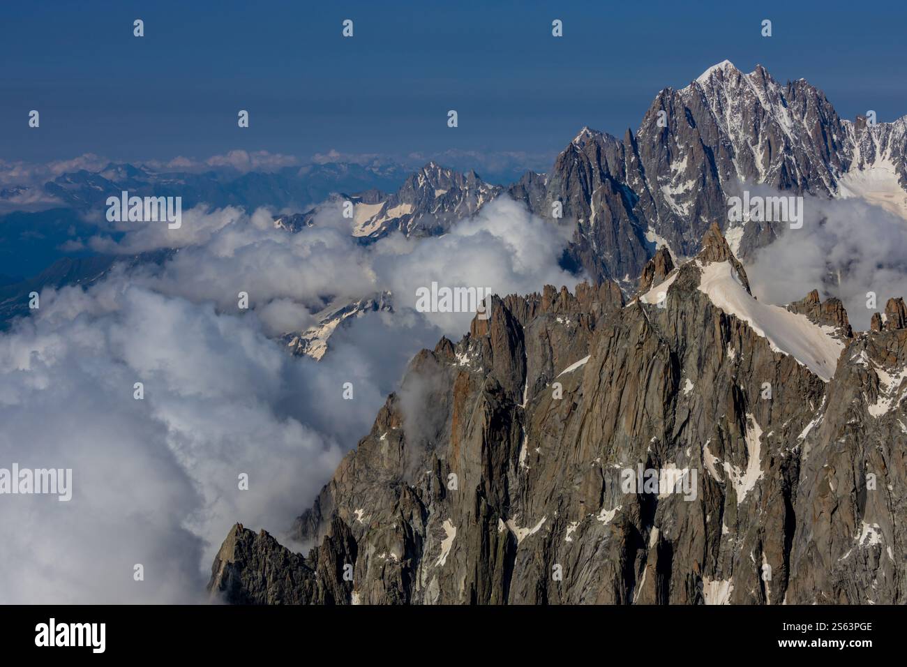 Snow mountain summits and white ice glacier in the Alps. Mont Blanc ...