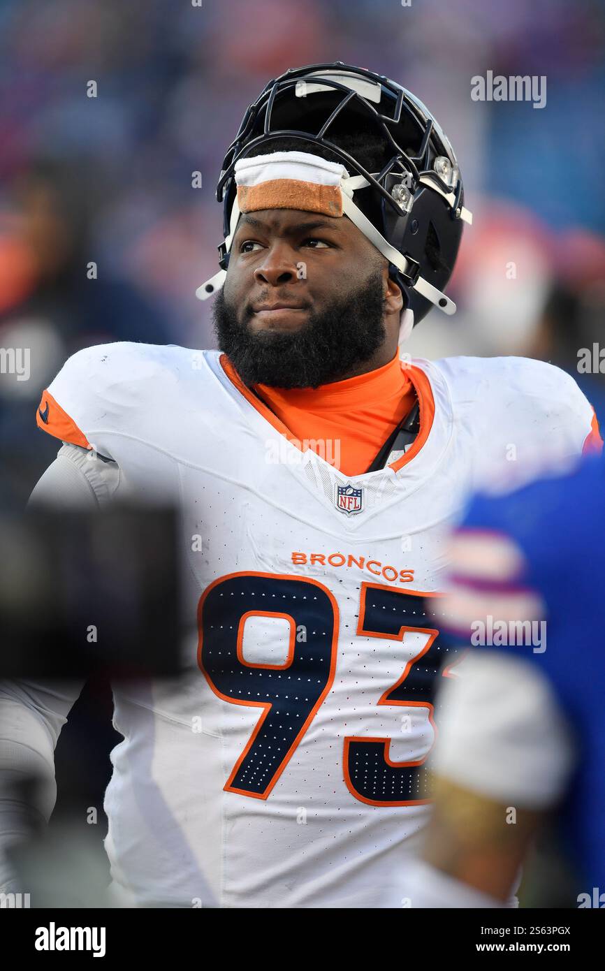 Denver Broncos defensive tackle D.J. Jones (93) walks on the field ...