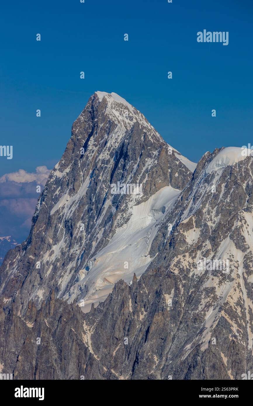 Snow mountain summits and white ice glacier in the Alps. Mont Blanc ...