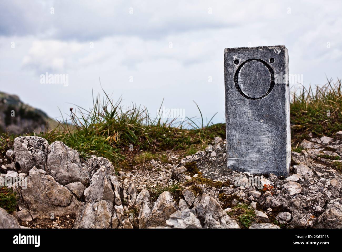 border mark austria on a path in the alps Stock Photo - Alamy