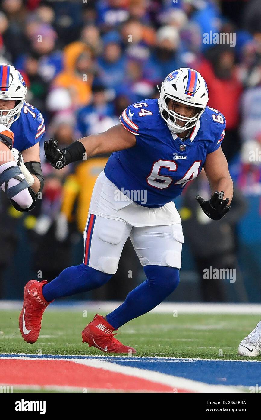 Buffalo Bills guard O'Cyrus Torrence (64) runs on the field during the ...