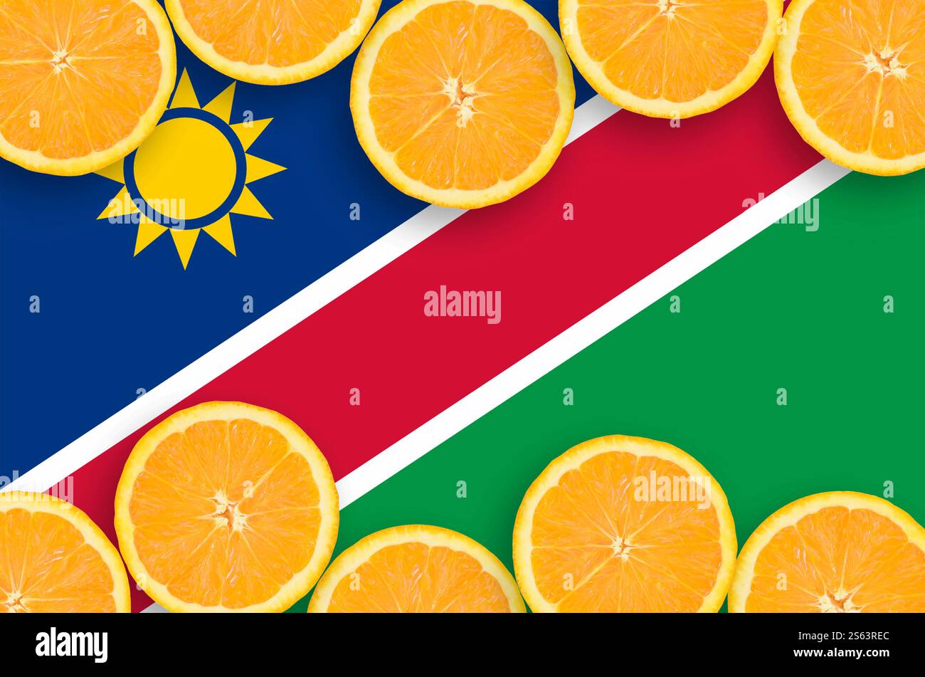 Namibia flag in horizontal frame of orange citrus fruit slices. Concept ...