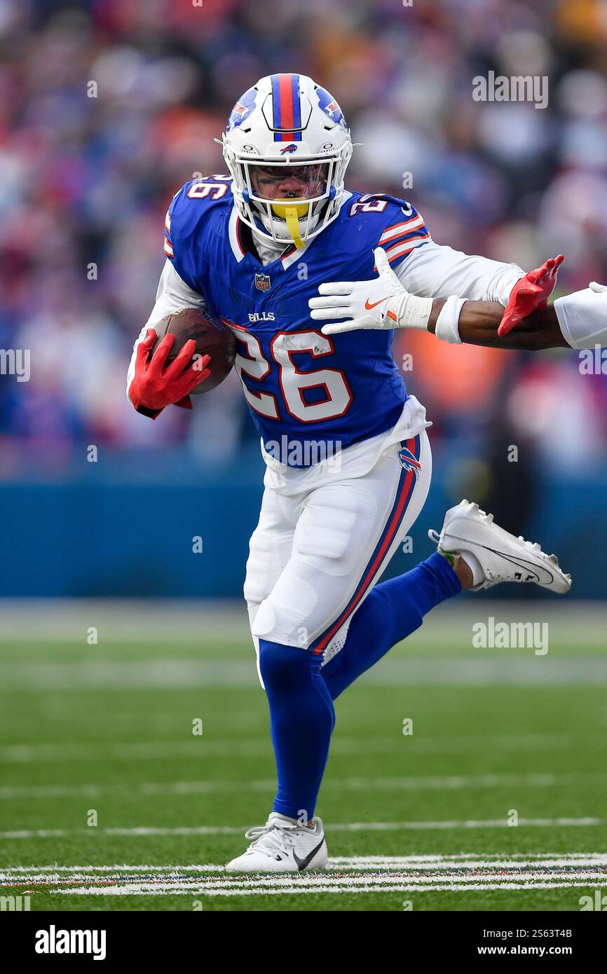 Buffalo Bills running back Ty Johnson (26) runs with the ball during ...