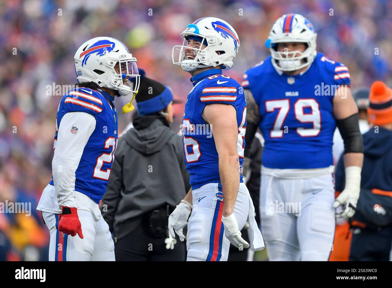 Buffalo Bills running back Ty Johnson, left, tight end Dalton Kincaid ...