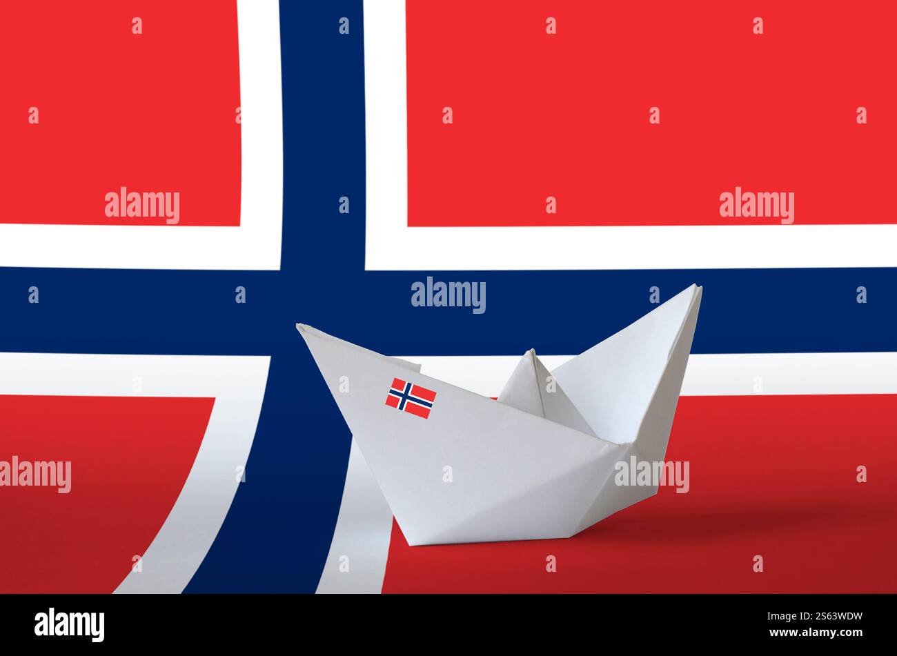 Norway flag depicted on paper origami ship closeup. Oriental handmade ...