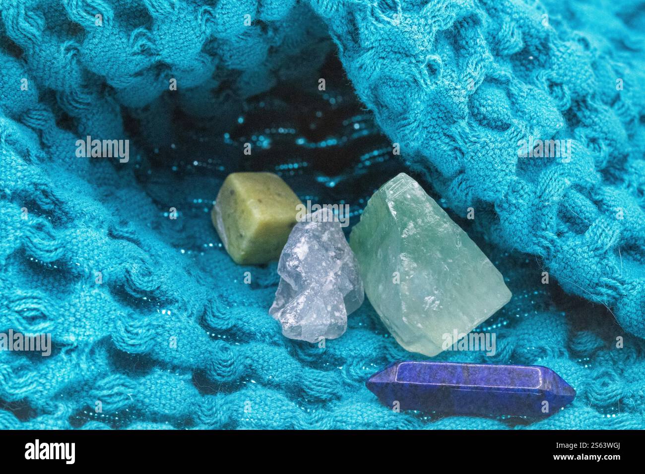 Blue background group of crystals different sizes. High quality photo ...