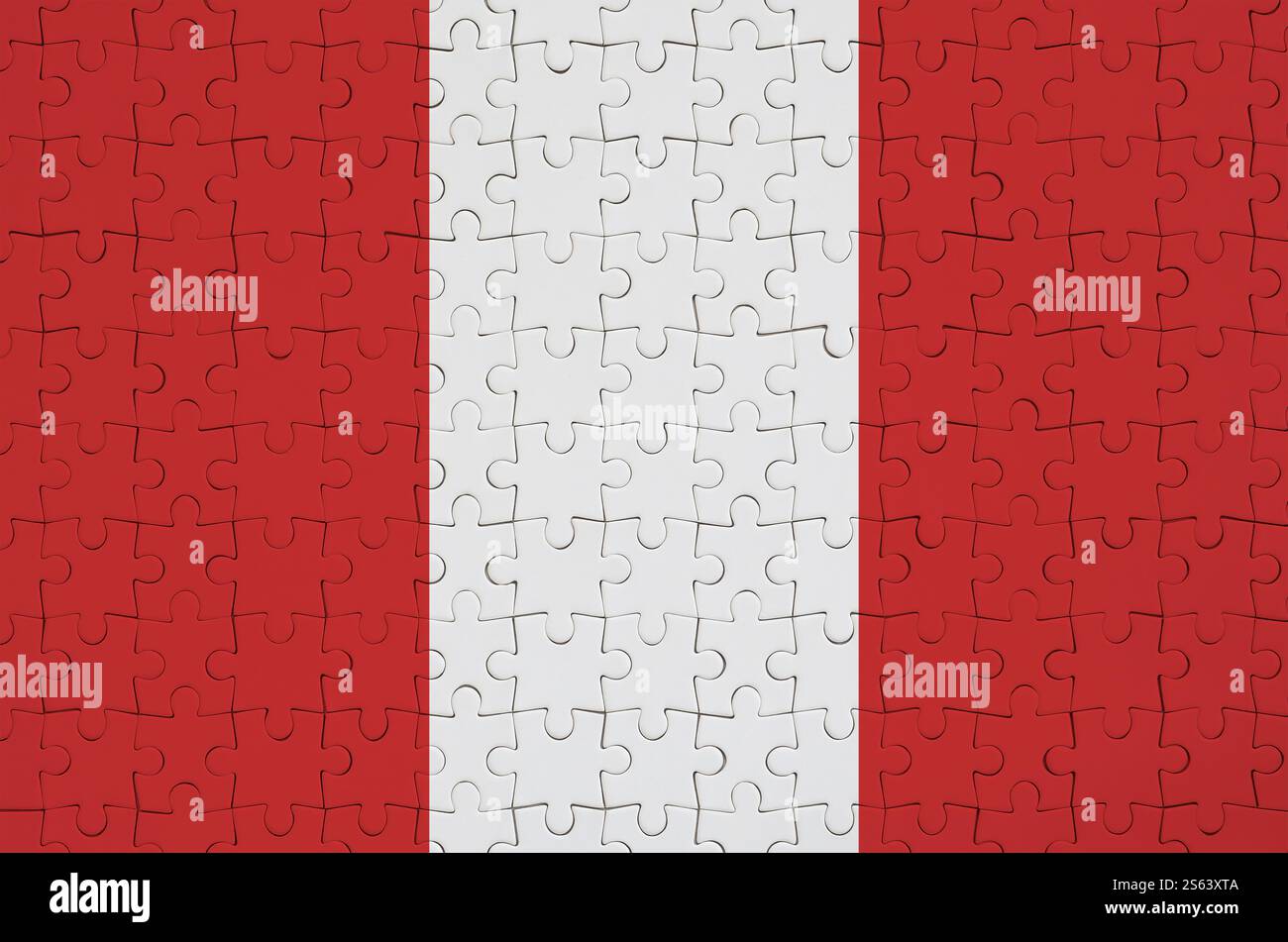 Peru flag is depicted on a folded puzzle Stock Photo - Alamy