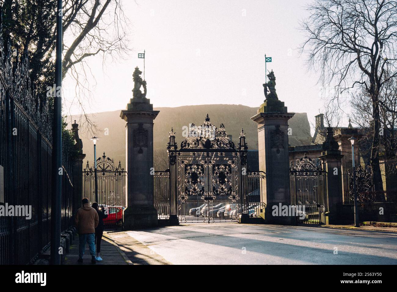 Sun shining through Holyrood Palace Gates in Edinburgh, Scotland Stock ...