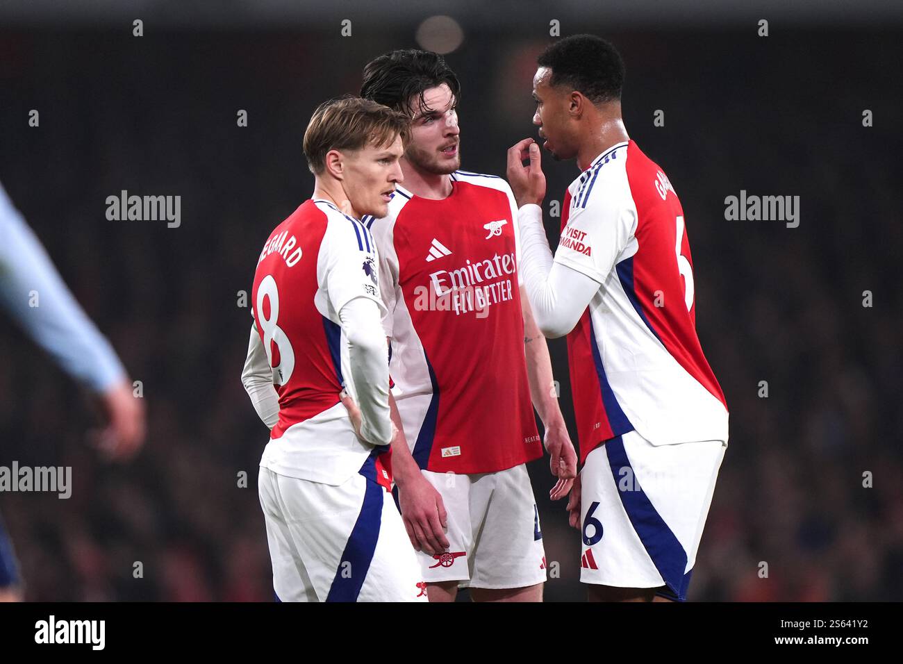 Arsenal's Martin Odegaard (left), Declan Rice and Gabriel in discussion ...