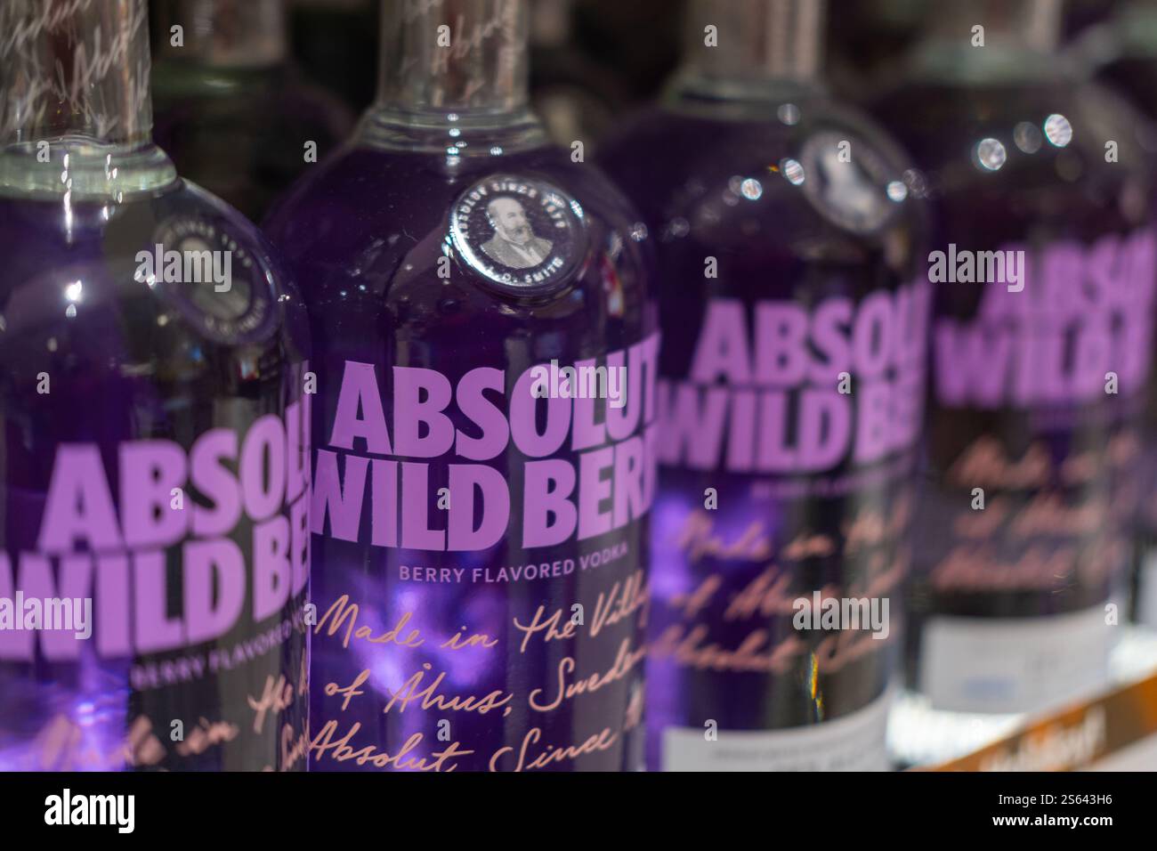 row Absolut Warhol vodka bottles close-up, commercial shot premium ...