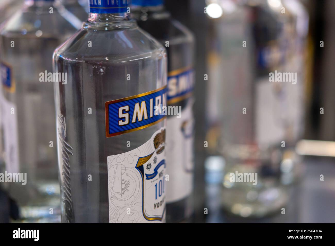 row Smirnoff vodka bottles on shelf, showcasing iconic branding, high ...
