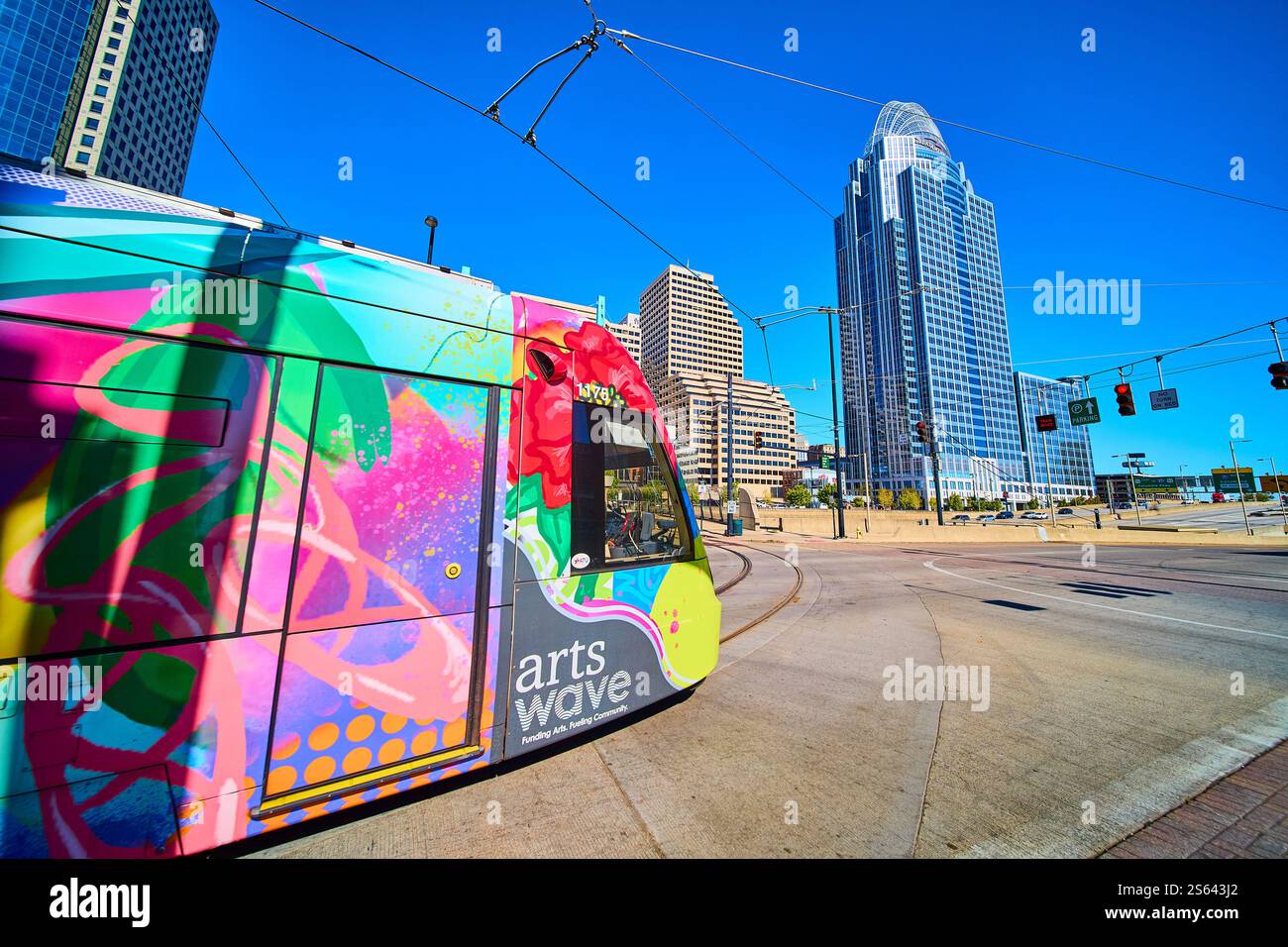 Cincinnati Streetcar Art in Motion with Skyline Street-Level View Stock ...