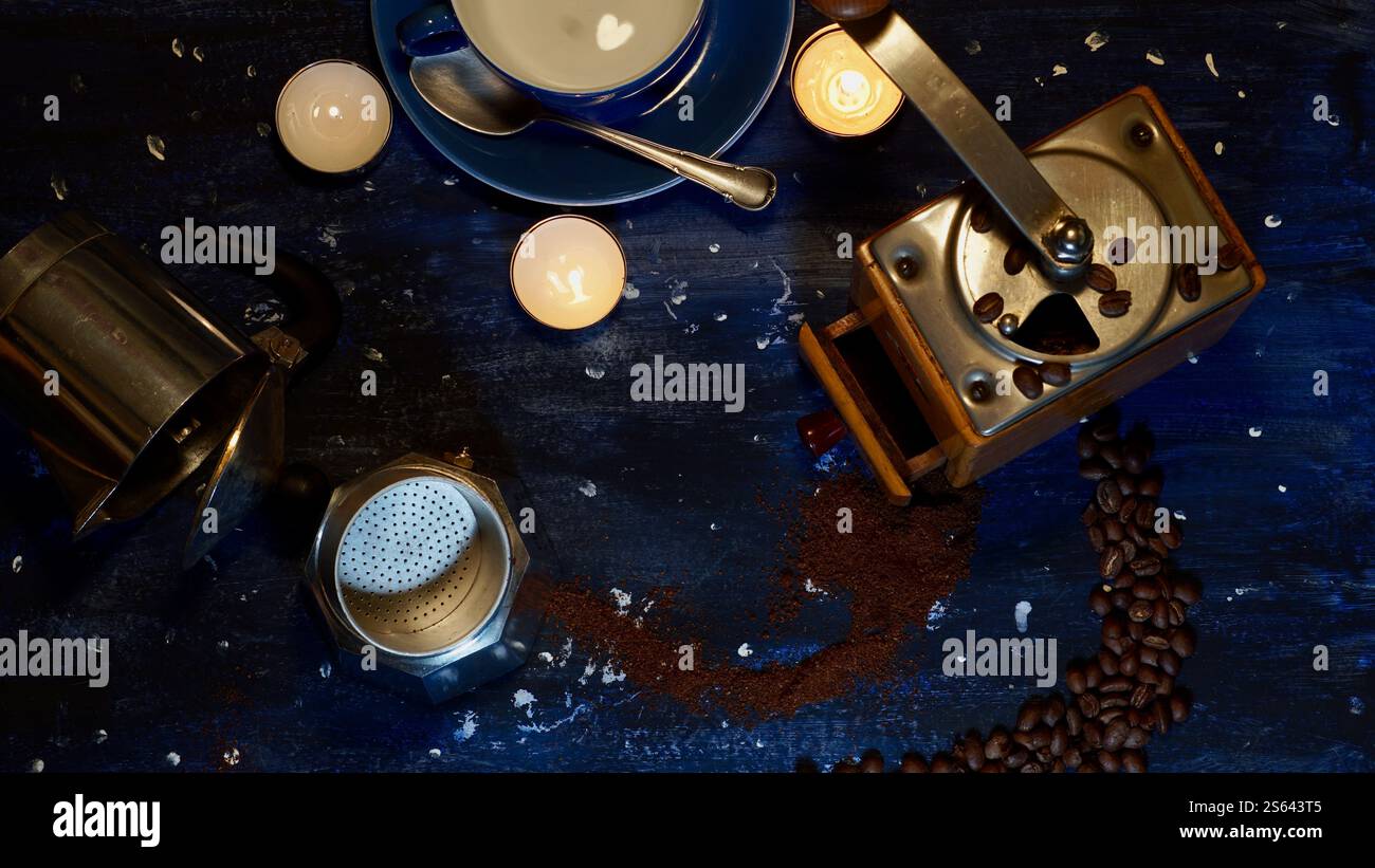 An old-fashioned coffee grinder and an espresso maker Stock Photo - Alamy