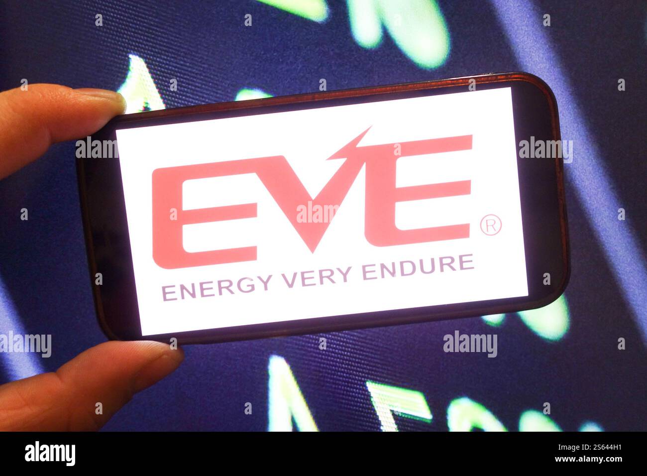 In this photo illustration, the EVE Energy company logo is seen ...