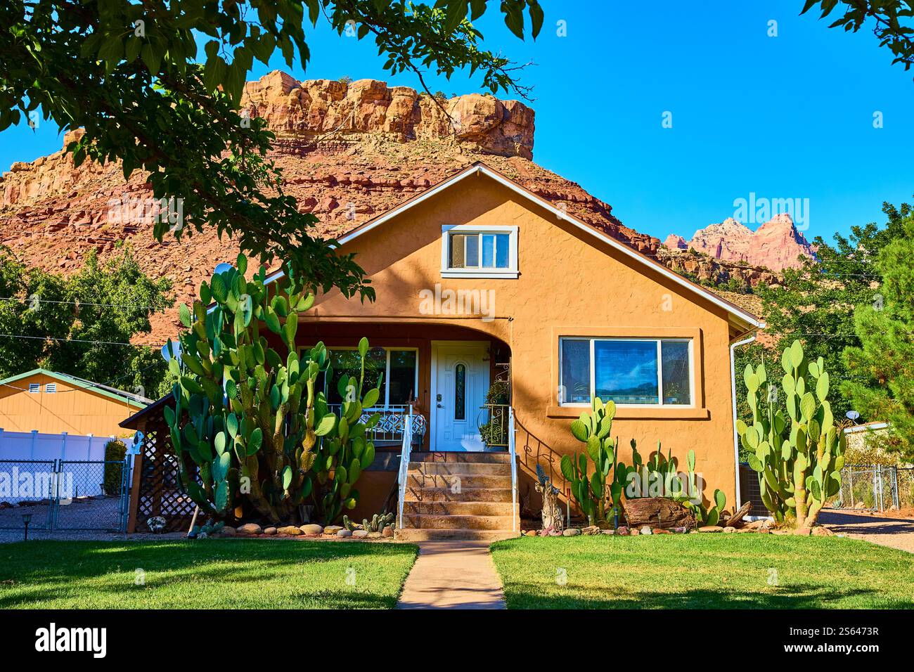 Adobe House and Cacti with Red Rocks Eye Level in Grafton Utah Stock Photo - Alamy