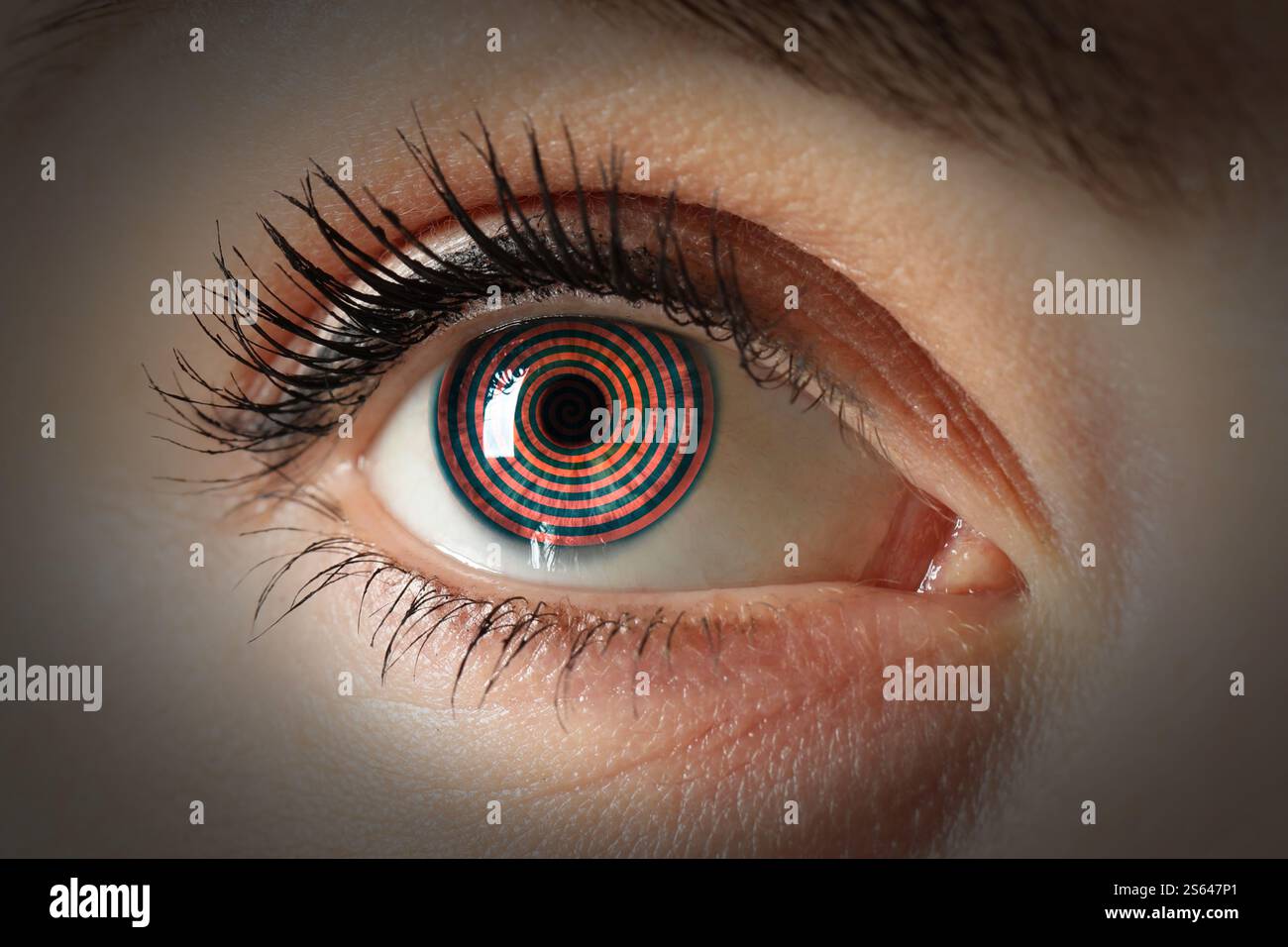 Hypnosis. Spiral symbolizing hypnotic effect in woman's eye, closeup ...