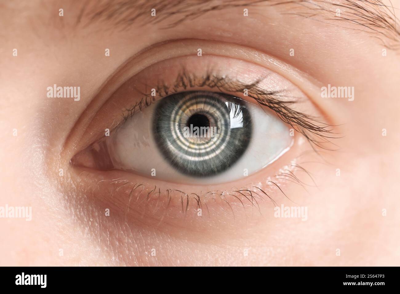 Hypnosis. Spiral symbolizing hypnotic effect in woman's eye, closeup ...