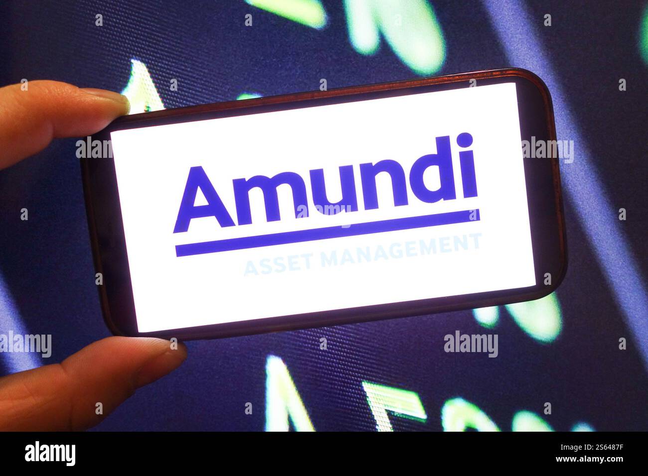 In this photo illustration, the Amundi company logo is seen displayed ...