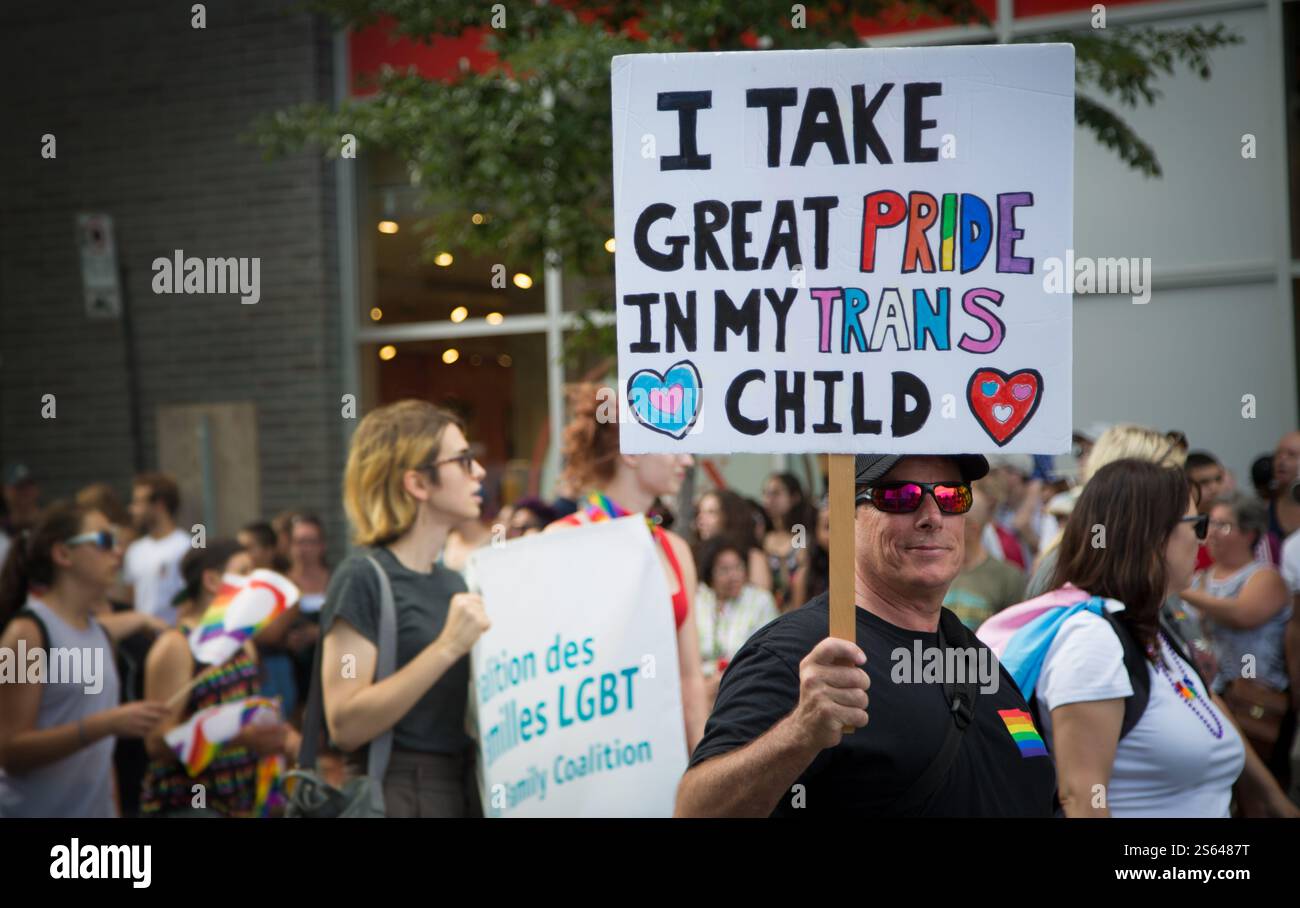Powerful Message of Acceptance and Pride as Father Holds Sign ...