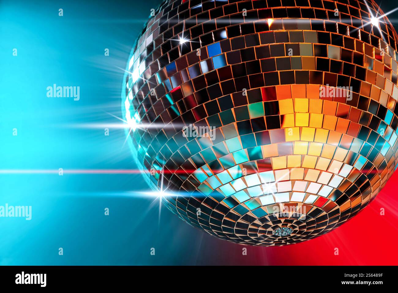 Disco ball reflecting light on colorful background. Nightclub decor ...