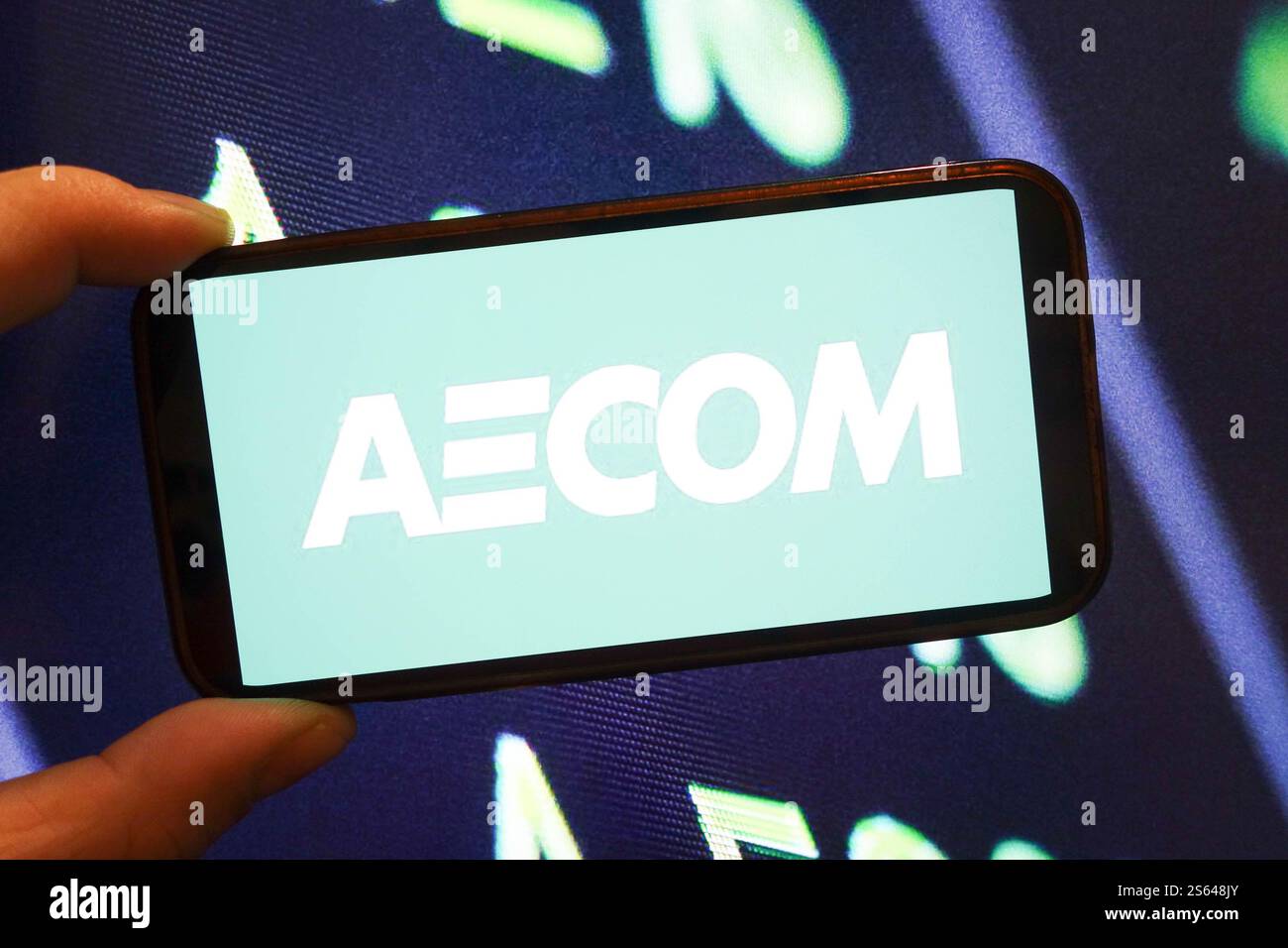 In this photo illustration, the AECOM company logo is seen displayed on ...