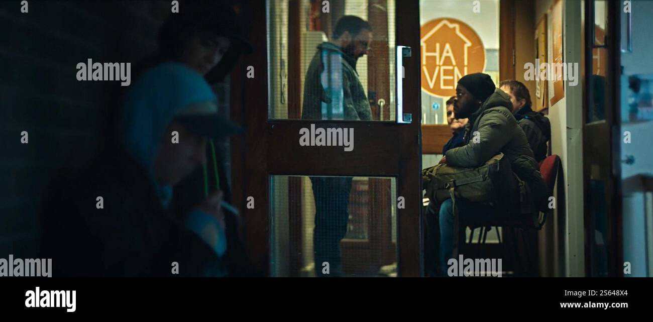 ROOM TAKEN, Gabriel Adewusi (sitting), 2023. © Vico Films / Courtesy ...