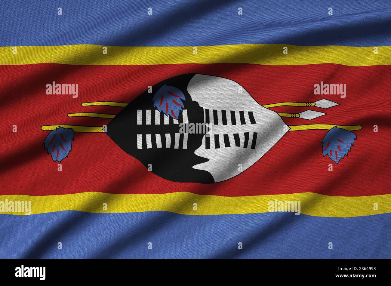Swaziland flag is depicted on a sports cloth fabric with many folds ...
