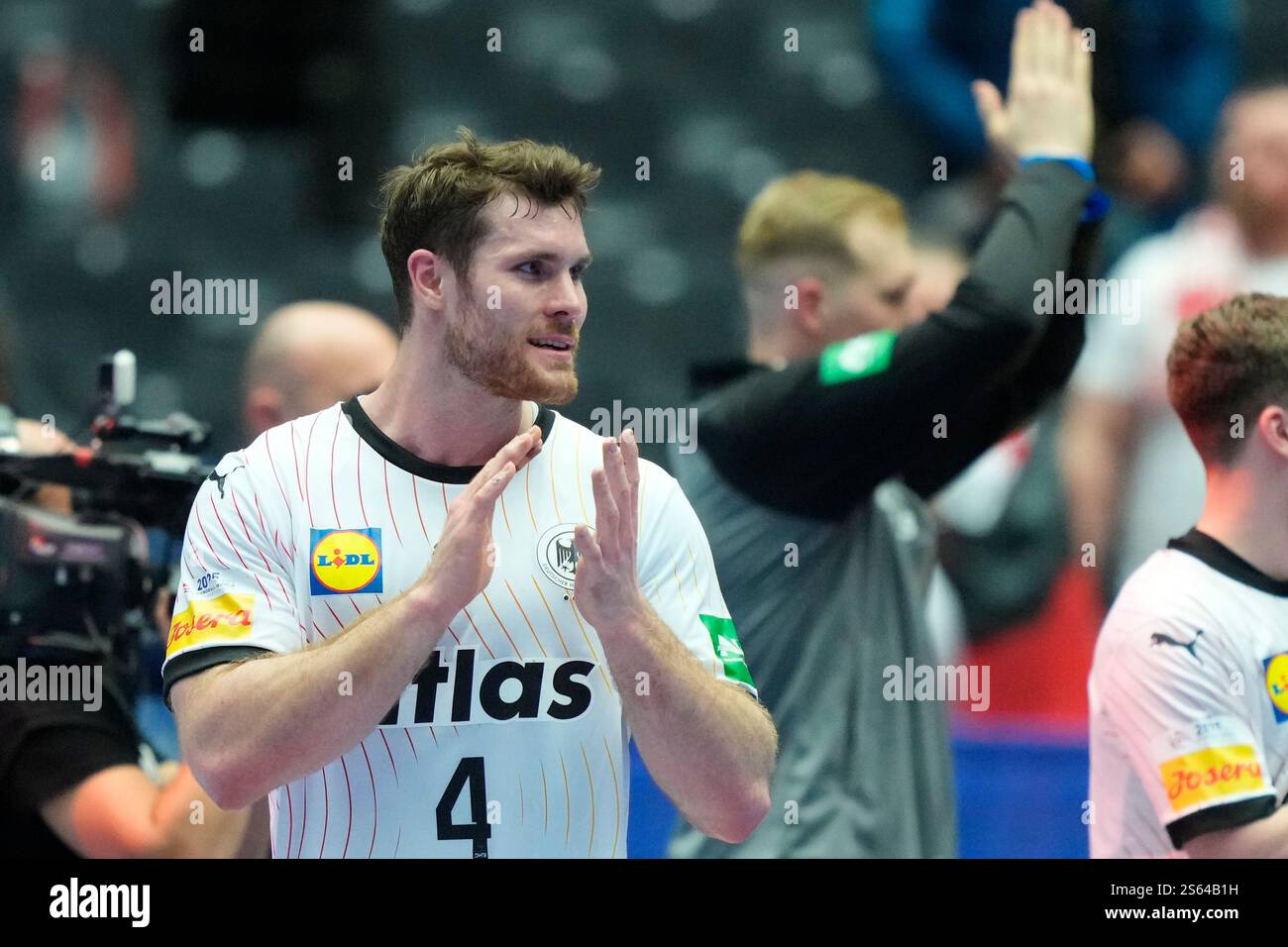 Germany's Johannes Golla reacts after the preliminary round group A ...