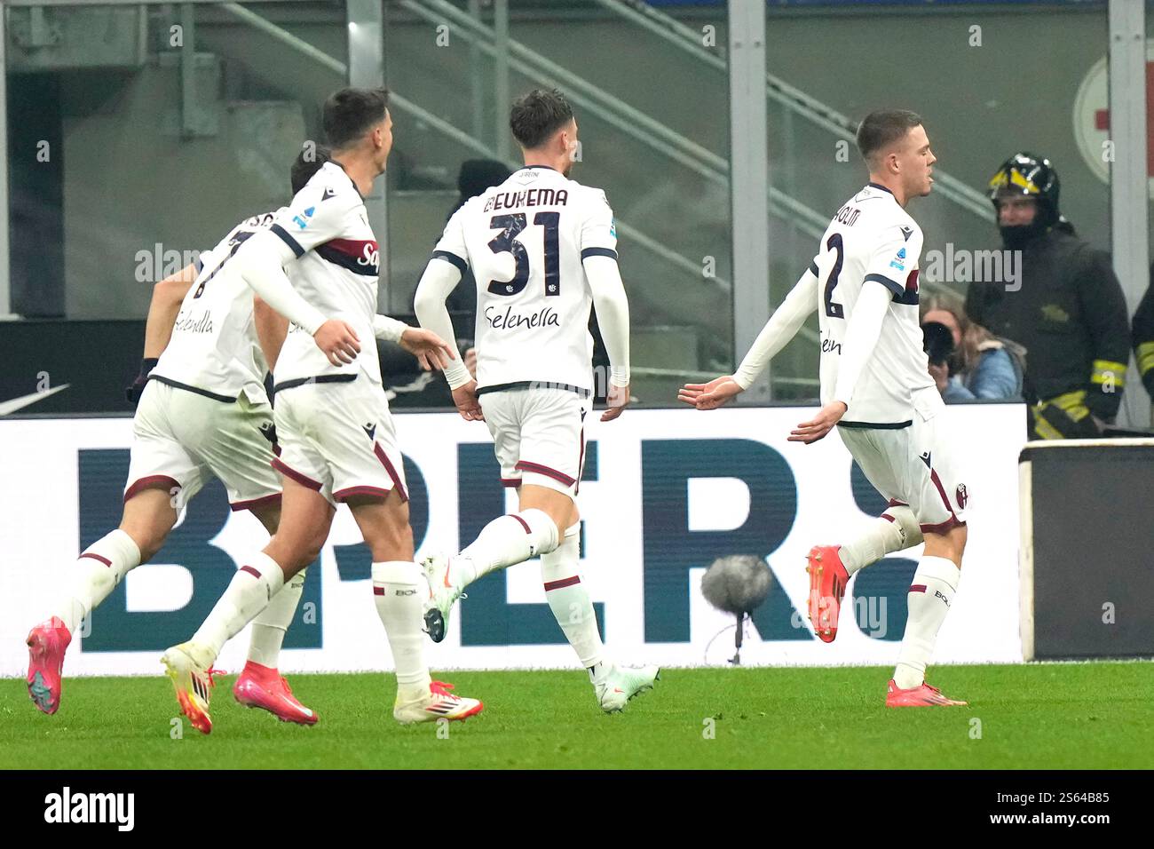 Bologna's Emil Holm, right, celebrates after scoring the second goal ...