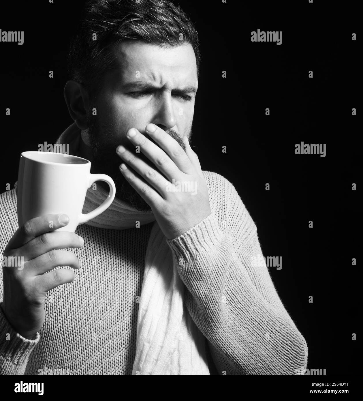 Bearded man drinking hot tea Black and White Stock Photos & Images - Alamy
