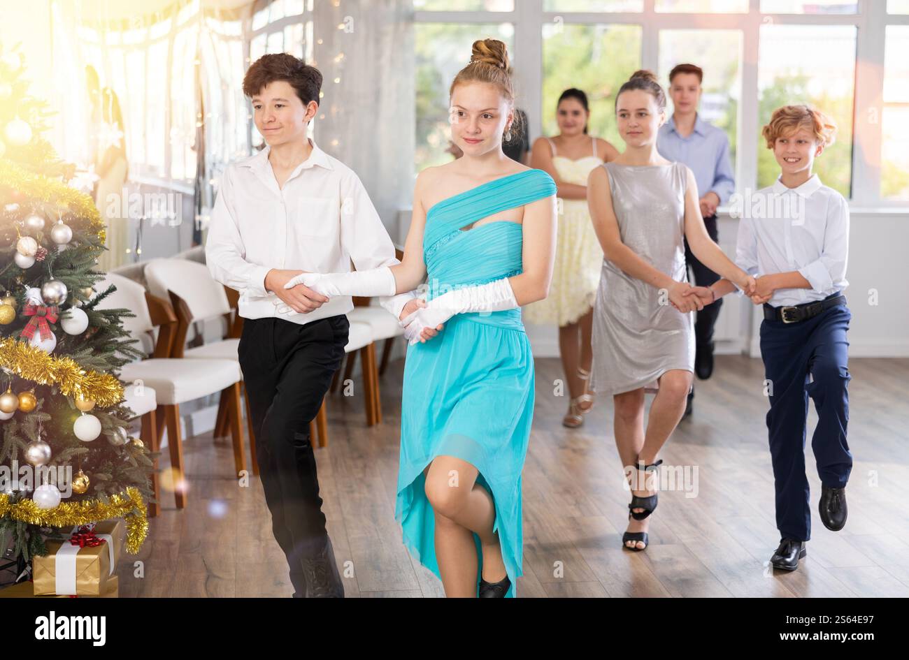 Boys and girls dancing folk dances in studio Stock Photo - Alamy