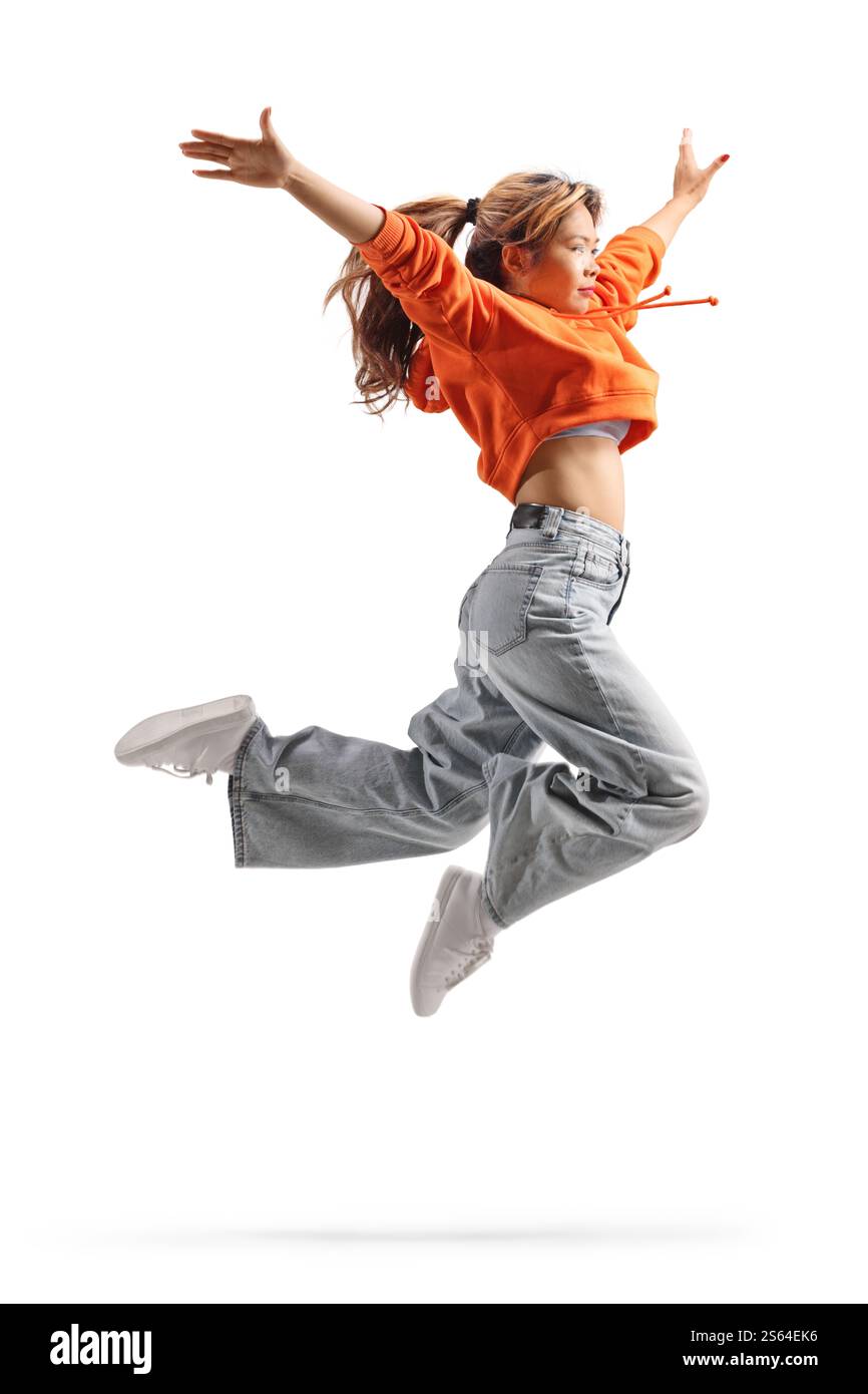 Young asian female dancer jumping isolated on white background Stock ...
