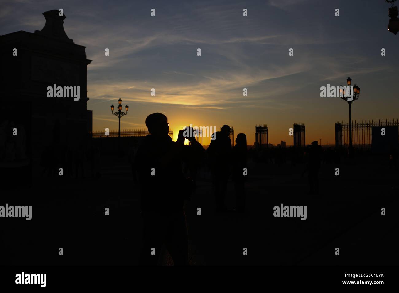 Madrid, Spain, 15th January, 2025: A boy taking a photo of the sun ...