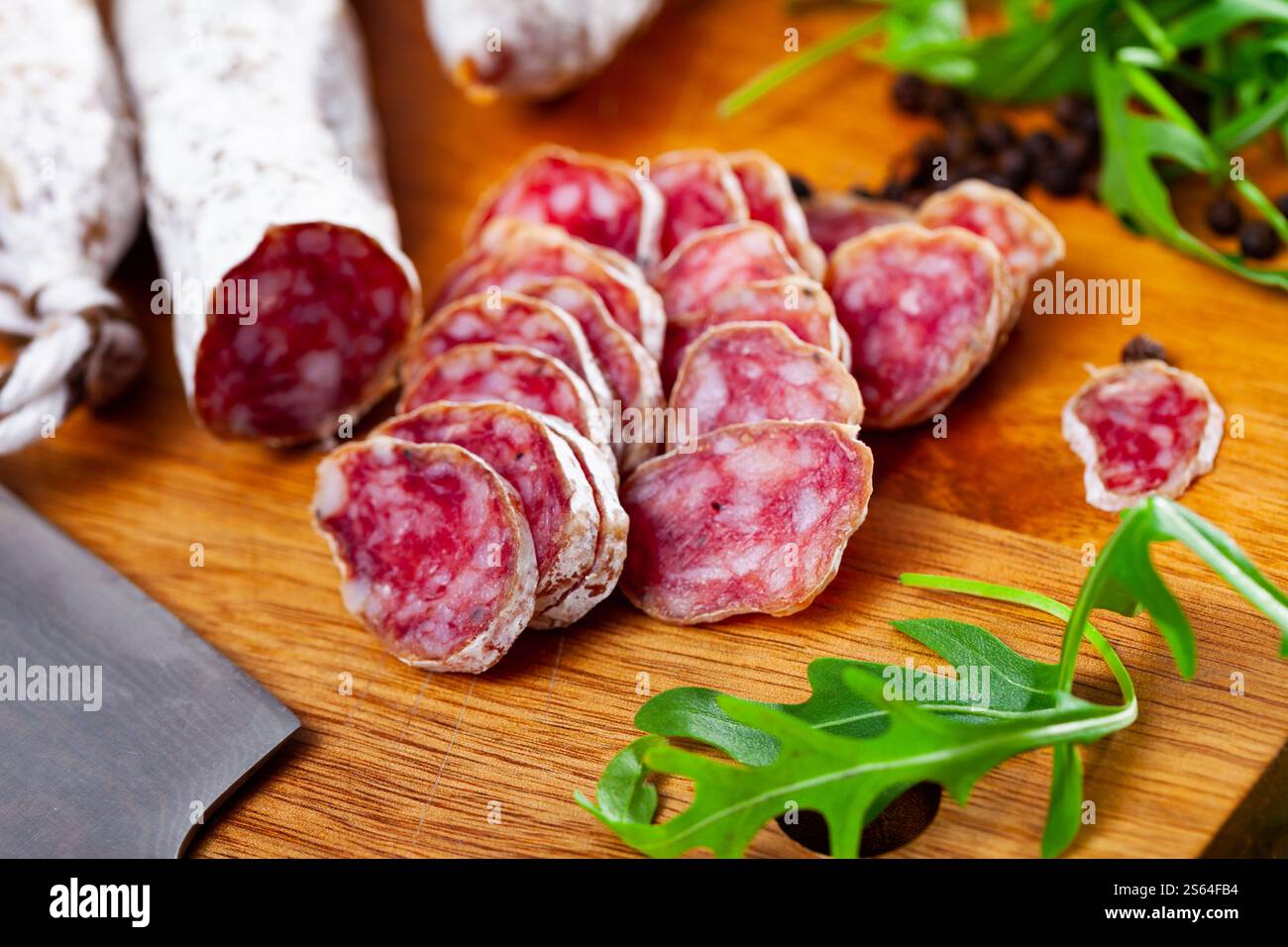 Traditional spanish thin salami sausage Fuet, sliced Stock Photo - Alamy