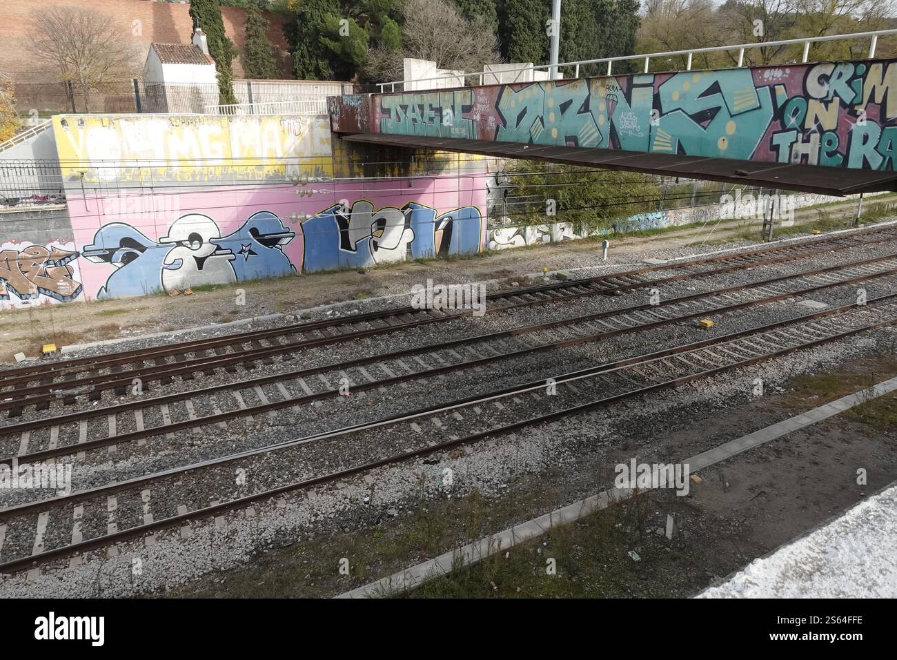 Train Track Wall and Overhead Bridge Painted with Graffiti Stock Photo ...