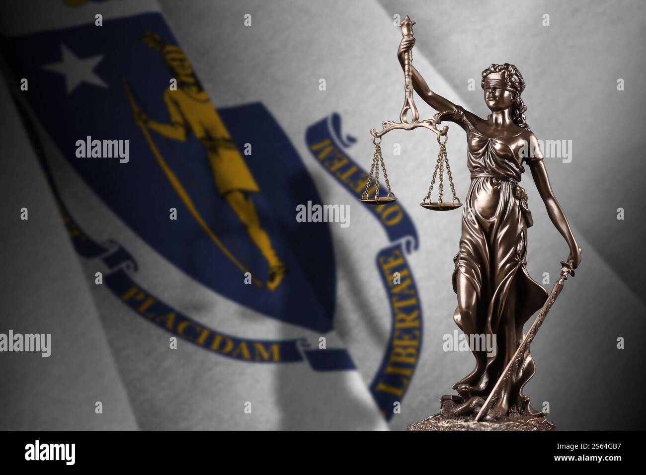 Massachusetts US state flag with statue of lady justice and judicial ...
